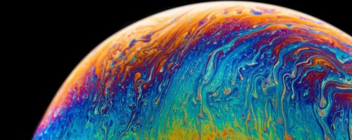 A Planet Full Of Colors On Black Background - Colorful Planet ...